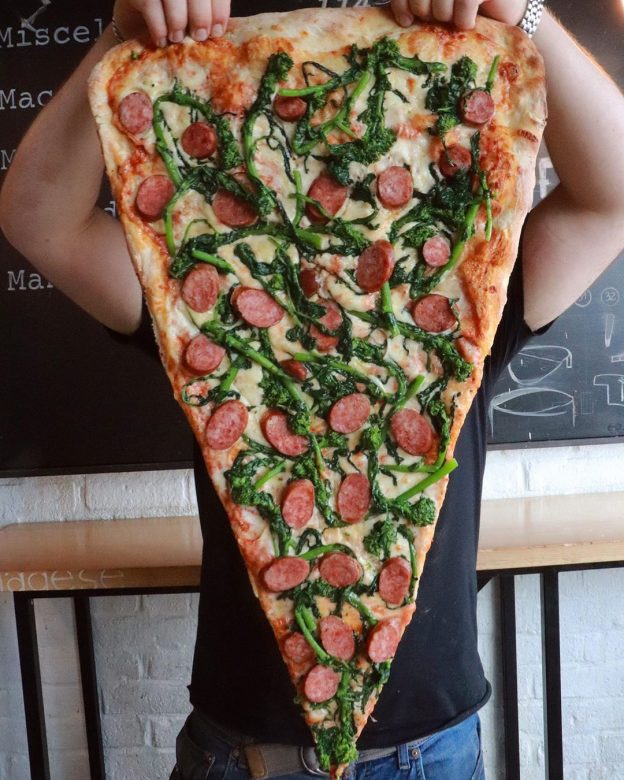 ≡ New Foodie Trend Is A Giant Pizza Slice – The Biggest You've Seen ...